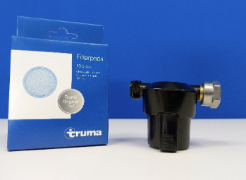 How do I change the filter pads on the Truma black gas filter?